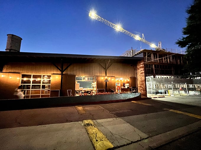 Night falls and Glide Pizza glows like a beacon for hungry souls seeking thin-crust perfection.