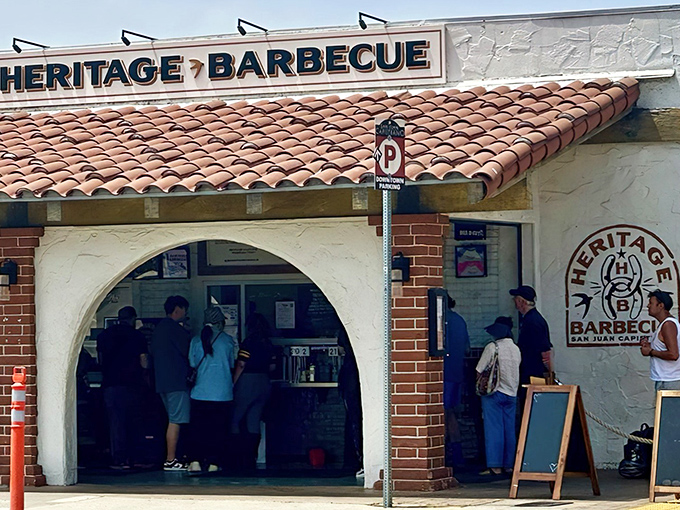 Heritage Barbecue's Spanish-style entrance isn't just inviting&mdash;it's practically a portal to meat paradise. The line forms early, but trust me, this brisket pilgrimage is worth every minute of waiting.