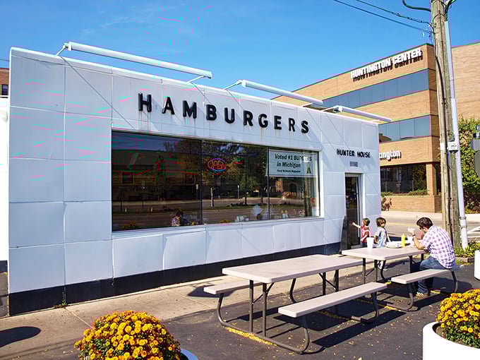 The gleaming white tile facade of Hunter House screams "burger paradise" like a beacon to hungry travelers.