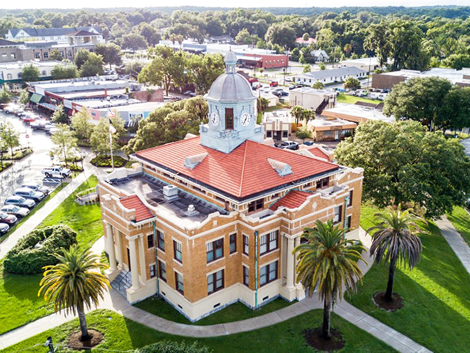 The historic Inverness courthouse stands proud with its distinctive dome, like a stately timekeeper watching over this affordable retirement haven.