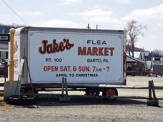 That trailer sign has more personality than most billboards! Jake's vintage marquee promises treasures from April to Christmas&mdash;the question mark after closing time is delightfully honest.