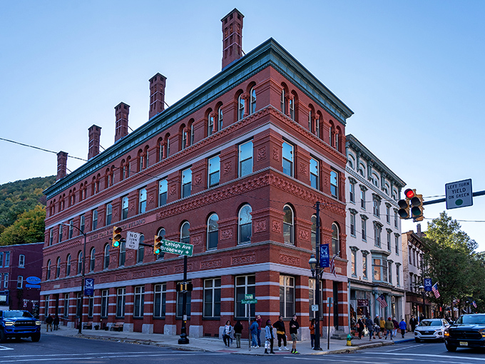 Jim Thorpe's historic red brick buildings stand like sentinels of time, where Victorian charm meets small-town magic.