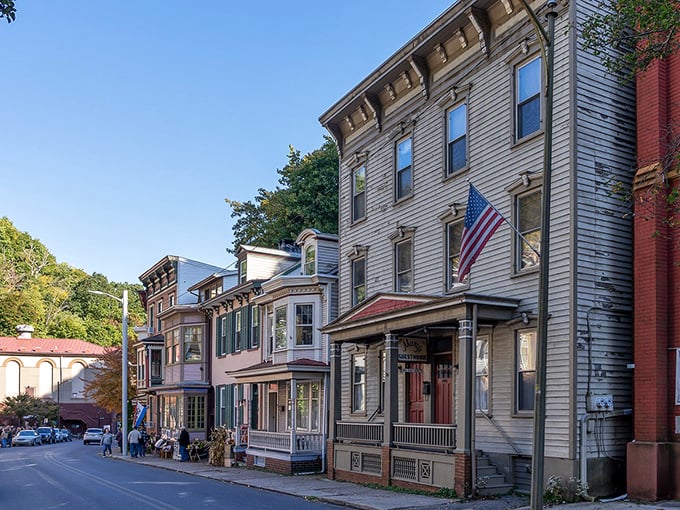 Historic Jim Thorpe's colorful Victorian buildings stand like a storybook come to life, complete with American flag proudly waving.