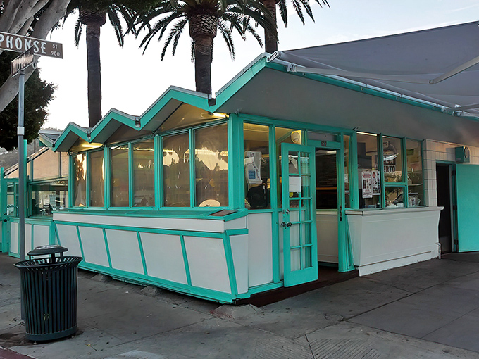 The iconic teal-trimmed taqueria that launched a thousand road trips. Simple, unassuming, and worth every minute in line.