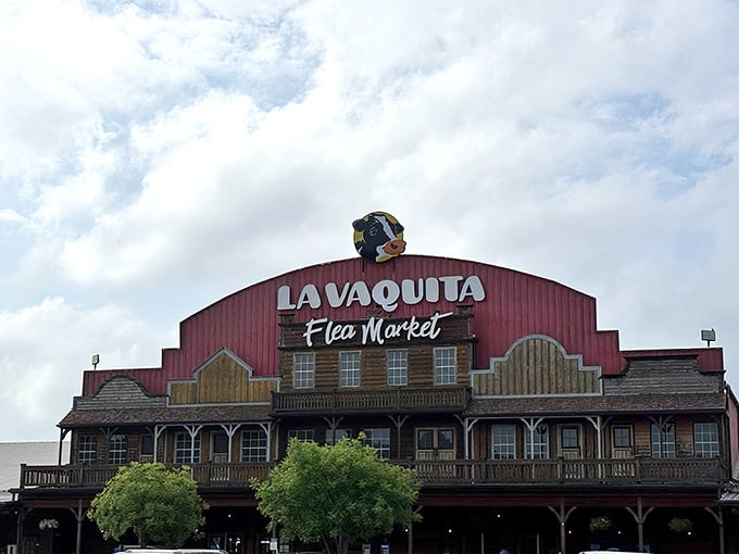 The Wild West meets bargain hunting at La Vaquita's iconic red barn facade. Treasure awaits inside!