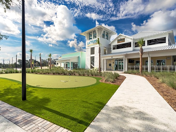 The Latitude Margaritaville clubhouse looks like Jimmy Buffett's dream come true, complete with a putting green for practicing your "it's 5 o'clock somewhere" swing.