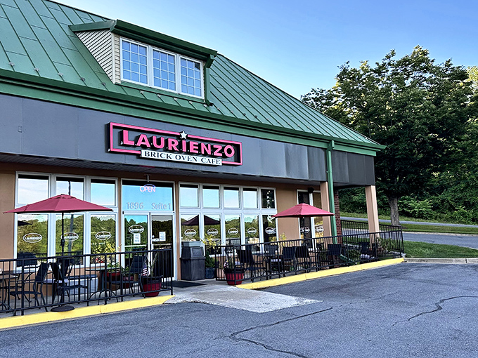 The green-roofed Laurienzo Brick Oven Cafe beckons with its simple charm, promising pizza magic within those unassuming walls.
