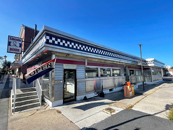 The Lincoln Diner's iconic black and white checkerboard trim isn't just decoration&mdash;it's a promise of timeless comfort food that never goes out of style.