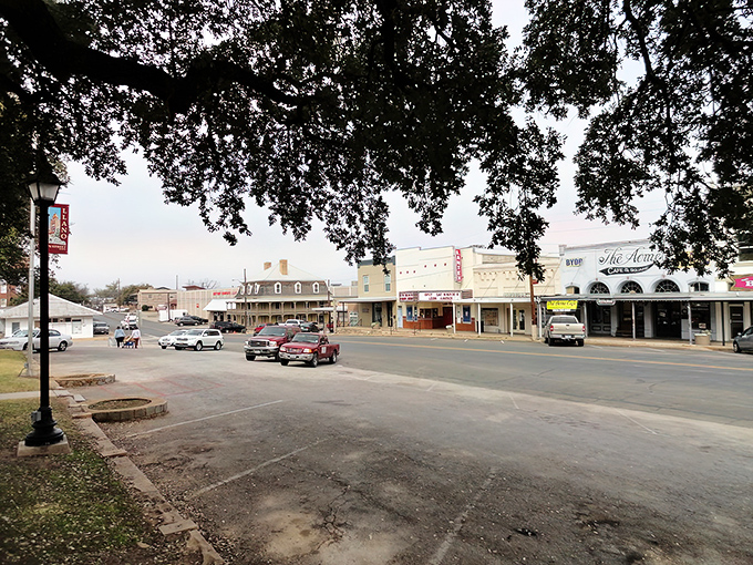 Look at Llano's Main Street! Those shady trees and historic storefronts transport you to a time when folks actually knew their neighbors.