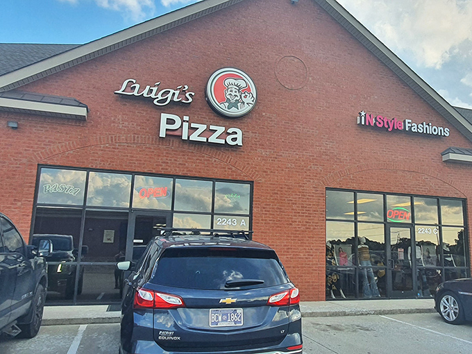 Luigi's Pizza might be hiding in a strip mall, but that classic sign promises authentic Italian magic waiting inside!