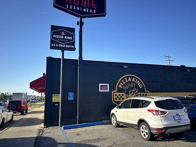 The unassuming black exterior of Pizza King hides a world of flavor inside. Sometimes the plainest packages hold the tastiest treasures!