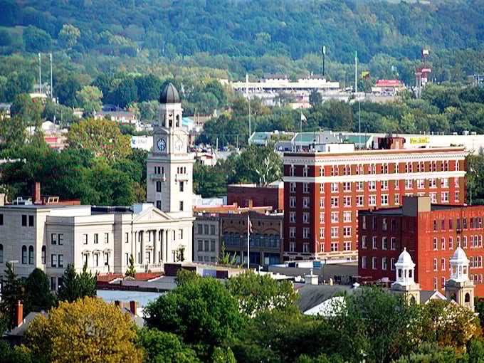 Marietta's skyline showcases its historic courthouse dome rising majestically above brick buildings that have witnessed centuries of Ohio River history.