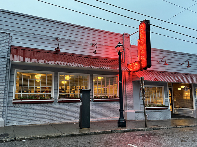 That glowing neon sign beckons like a lighthouse for hungry souls seeking Southern comfort in Atlanta's urban sea.