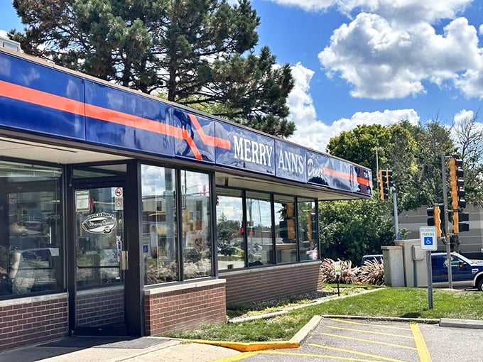 The iconic blue and orange exterior of Merry Ann's Diner stands ready to welcome hungry Champaign locals like an old friend.