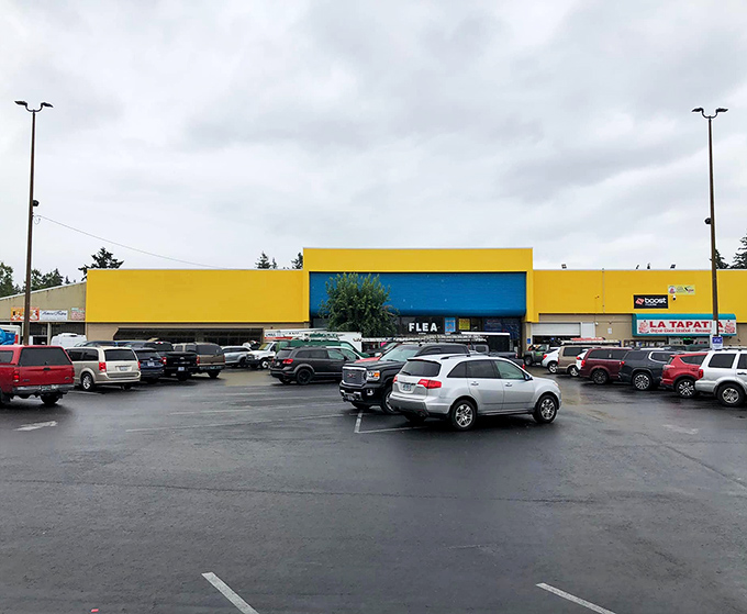 The bright yellow exterior of Oregon Flea Market stands like a beacon of bargain-hunting hope. Even on cloudy days, this Portland treasure trove shines!