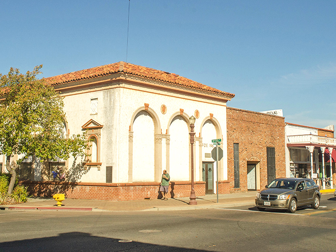 Spanish charm meets small-town budget! This Oroville sunny corner building whispers tales of Gold Rush days while keeping your wallet happy.