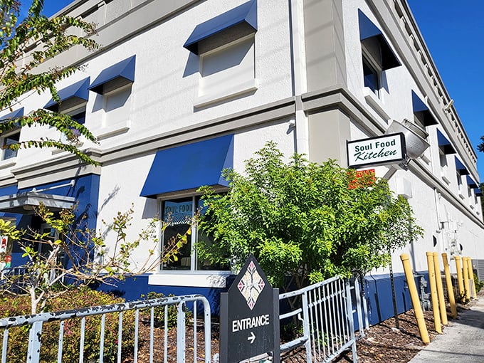 Sometimes the best soul food hides behind modern facades - those blue awnings are your treasure map to comfort.