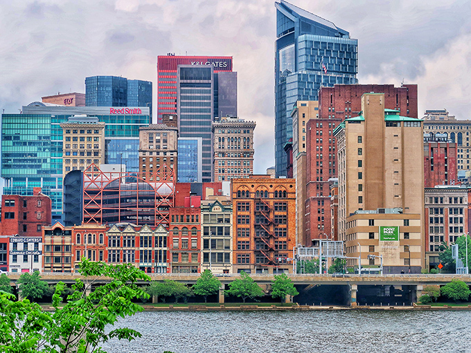 Pittsburgh's skyline shimmers along the river like a colorful Lego set built by giants with impeccable taste.
