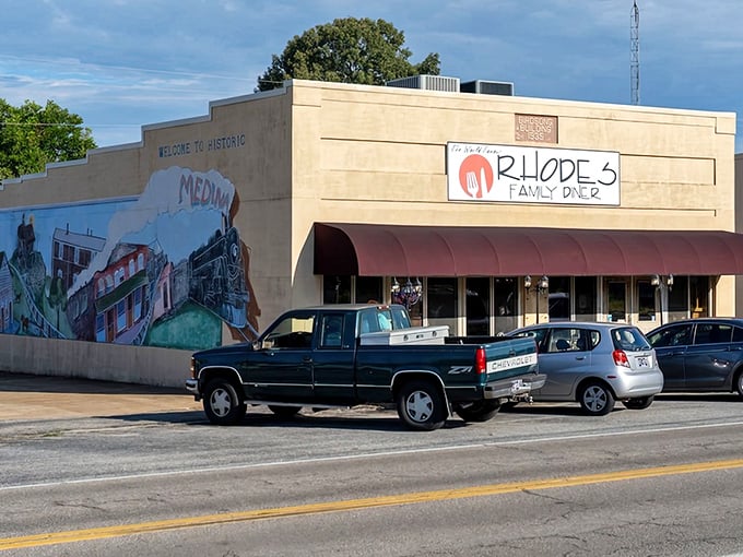 Rhodes Family Diner sits proudly on Main Street like a beacon for hungry souls seeking comfort.