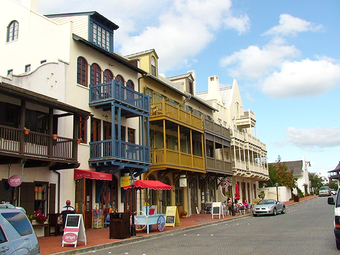 Colorful balconies and charming storefronts line Rosemary Beach's cobblestone streets, creating a European village vibe right on Florida's Gulf Coast.