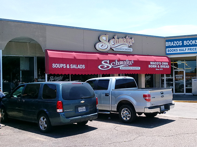 Schmaltz's iconic red awning has been beckoning sandwich lovers since 1975. A Waco institution where bread dreams come true!