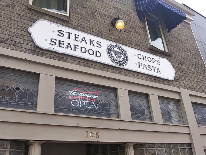 The classic storefront sign promises exactly what you'll find inside &ndash; steaks that make you forget your own name.