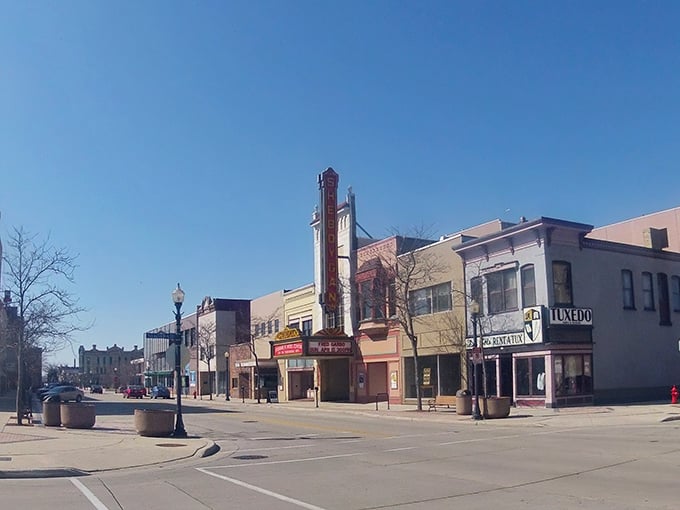 Downtown Sheboygan's historic theater marquee stands tall, a beacon of small-town charm where retirees enjoy affordable entertainment options.