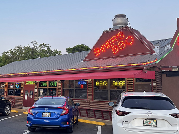 Like stepping into a Wild West movie set, this log cabin barbecue joint promises authentic smoky adventures ahead.
