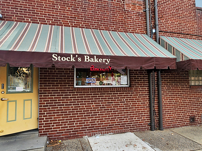 That classic striped awning isn't just decoration—it's a beacon of hope for butter cake enthusiasts across Philadelphia's Lehigh Avenue!