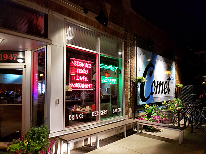The neon glow of Comet Cafe beckons night owls with its midnight promise. Like a diner from an Edward Hopper painting, but with better bacon.