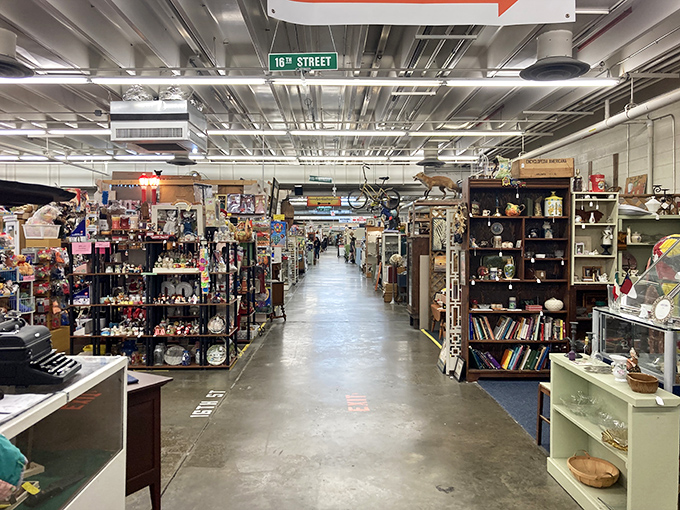 Long aisles of treasures at The Factory Antique Mall, where every shelf tells a story waiting to be discovered.