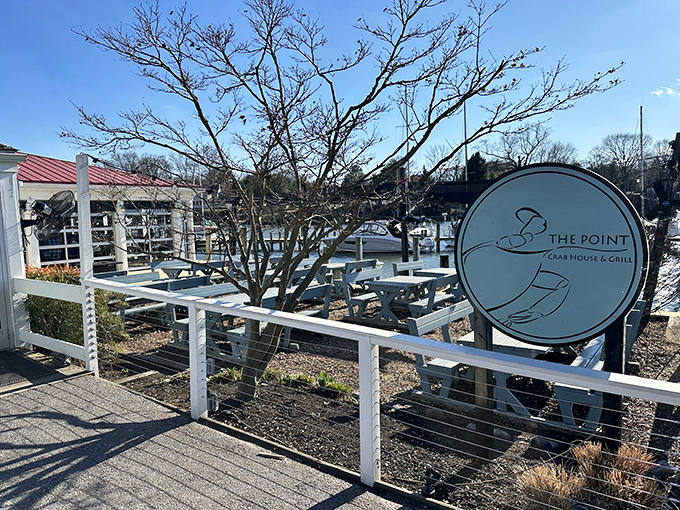 The Point's waterfront dining area beckons with promise of fresh catches and gentle breezes. Maryland seafood with a view!
