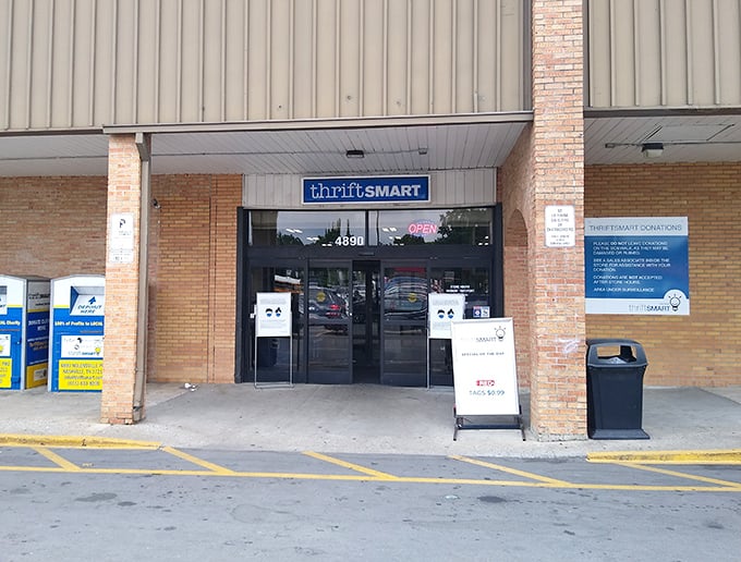 ThriftSmart's welcoming storefront promises treasure hunting adventures behind those brick walls. Blue tag specials await!