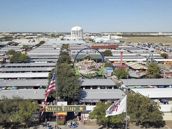 Aerial view of Traders Village Grand Prairie—a sprawling metropolis of bargains where shoppers become explorers in a vast sea of treasures.