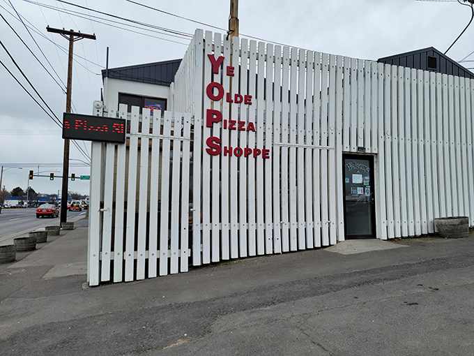 The white picket fence facade of Ye Olde Pizza Shoppe isn't trying to impress anyone&mdash;except your taste buds when you walk through that door.