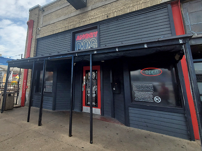 Simple black exterior, serious hot dog business inside. Angry Dog's no-frills approach lets their legendary dogs do all the talking.