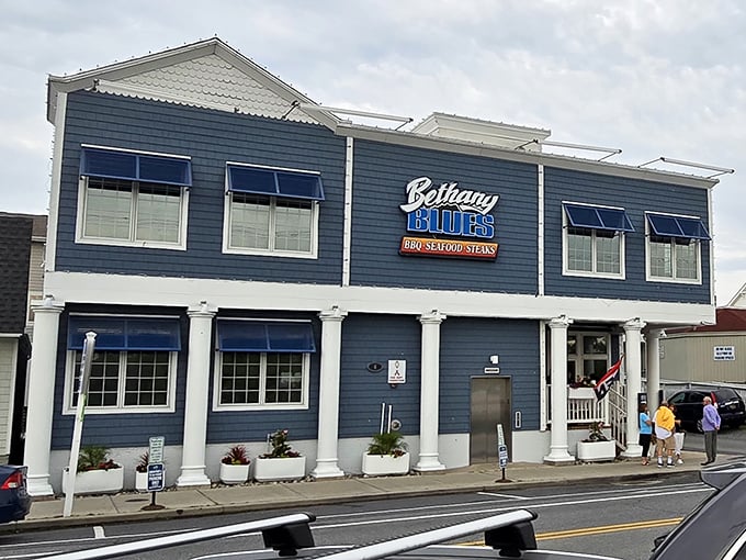 Coastal charm with a side of smoke! Bethany Blues' inviting fa&ccedil;ade promises a delicious escape from ordinary beach food.
