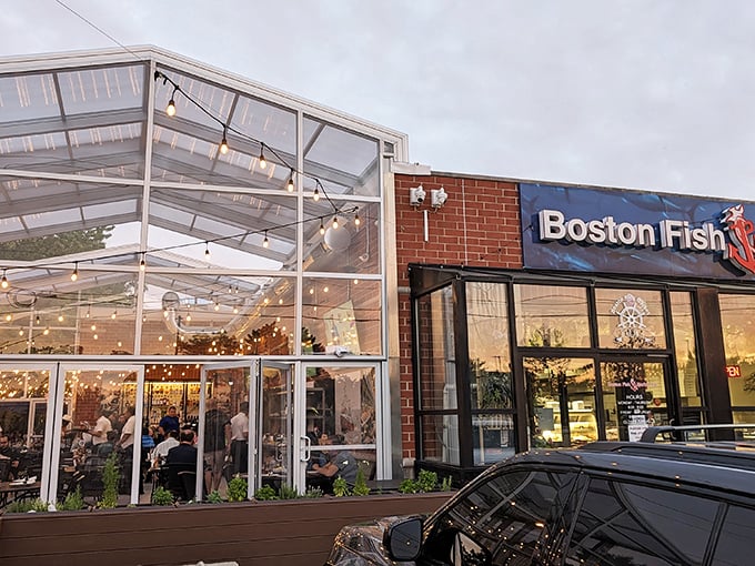 Twinkling lights and a glass-enclosed dining area transform this market into a magical seafood experience after dark.