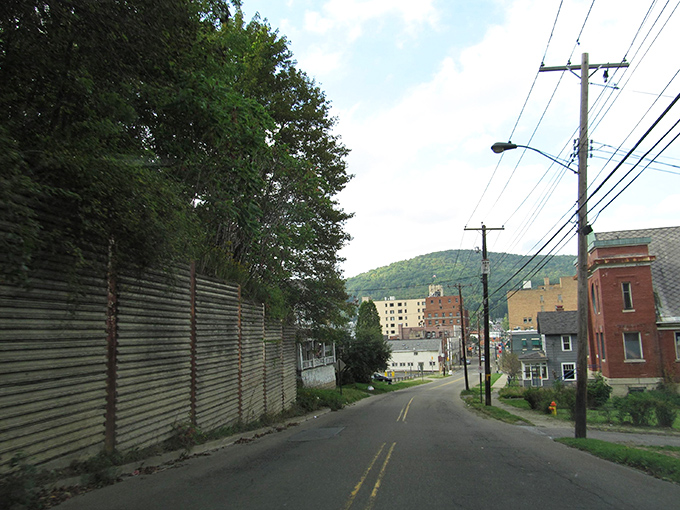 Quiet streets wind through Bradford, where affordable living meets small-town charm against a backdrop of rolling Allegheny foothills.