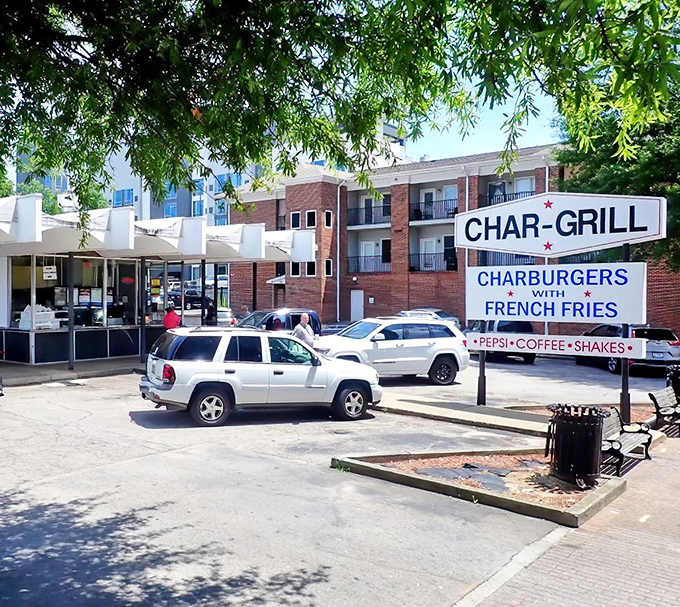 Char-Grill's distinctive zigzag roof and retro signage stand as a monument to the timeless appeal of a perfectly grilled burger.