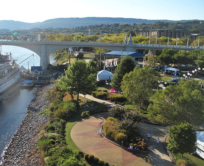 From above, Chattanooga's riverfront park unfolds like a green carpet welcoming visitors to Tennessee's scenic gem.
