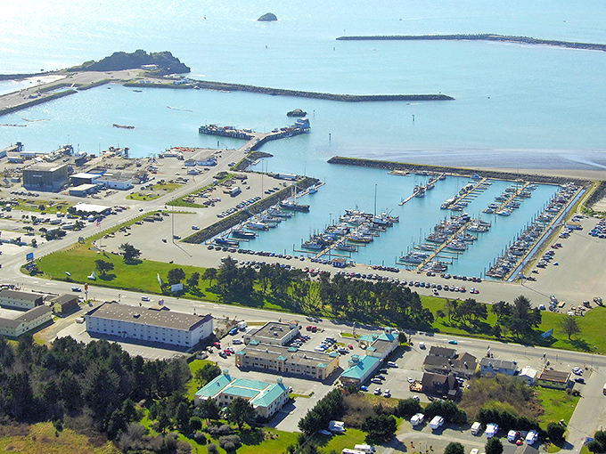 The harbor at Crescent City shelters fishing boats and dreams alike, where retirement dollars stretch as far as the ocean views.
