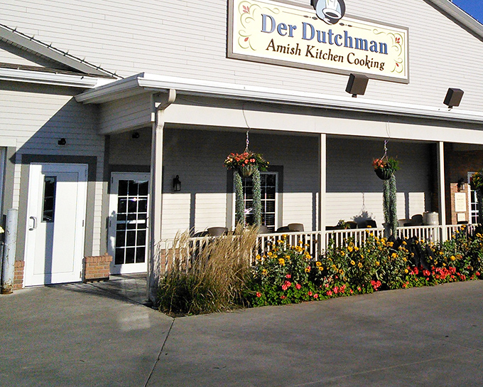 Flower baskets and a charming porch at Der Dutchman invite you in. Like Grandma's house, if Grandma could feed an army.