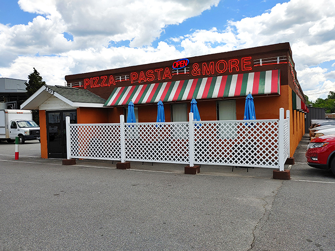 That classic red and green awning isn't just decoration&mdash;it's a time-tested signal that authentic Italian-American comfort awaits inside.