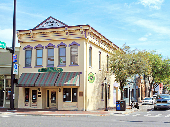 This 1887 French Building in Gainesville whispers artistic secrets beneath that jaunty striped awning.