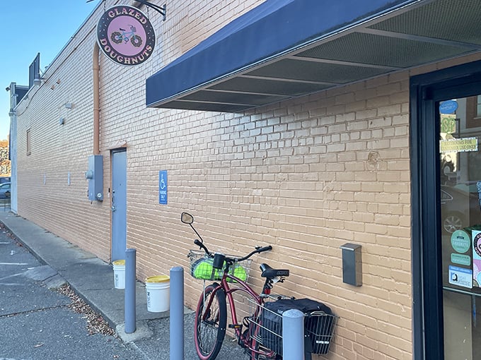 That iconic bicycle sign isn't just cute &ndash; it's a local beacon signaling "life is too short for bad donuts." Hampton's morning headquarters!