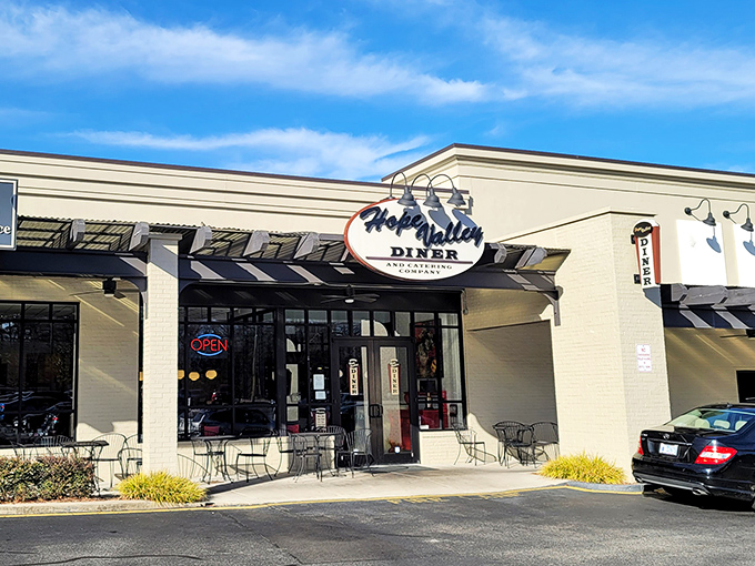 Where morning sunshine meets buttery biscuits. This Durham gem's welcoming facade is the gateway to breakfast paradise.