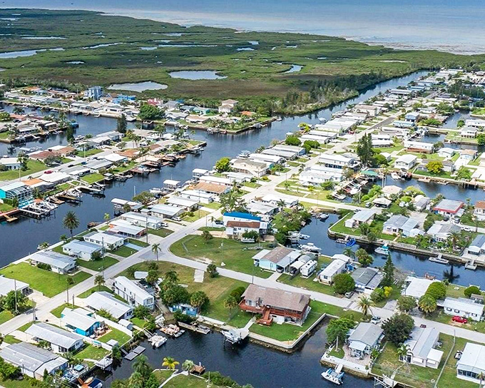 Where backyards meet boat docks. Hudson's canal-front living makes every day feel like vacation without the resort prices.
