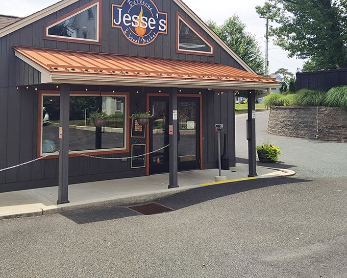 Copper trim and dark wood exterior&mdash;Jesse's knows presentation matters before you even taste their smoky treasures.