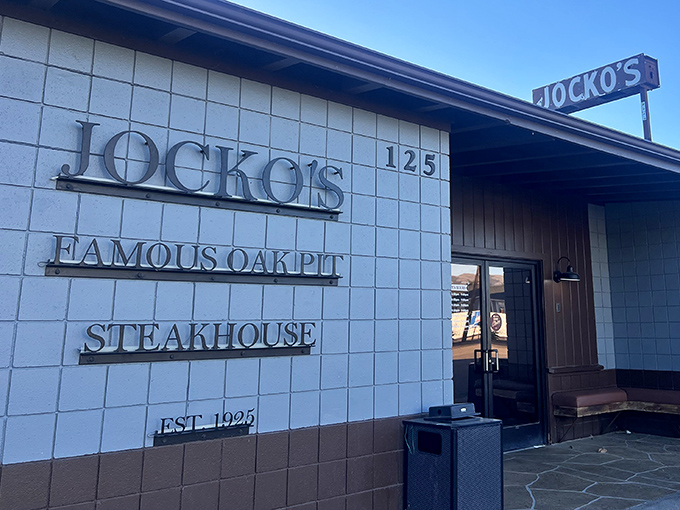 When "Famous Oak Pit" is carved right into the building, you know they're serious about smoky, tender beef perfection.